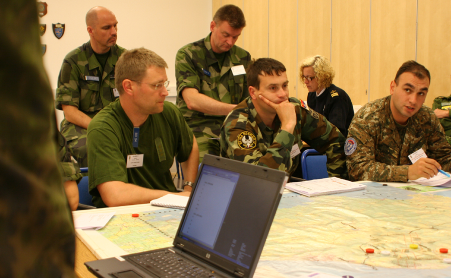 Staff officers conducting the final Command Post Exercise - Swedish ...
